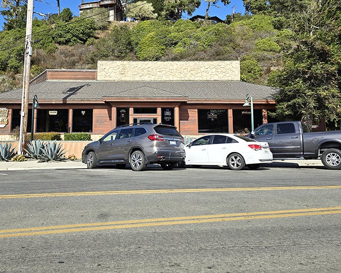 The unassuming exterior of Main Street Grill in Cambria hides culinary treasures within. Like finding a diamond in a haystack, but the haystack is delicious too.