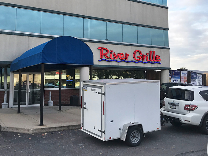 The blue awning beckons like a culinary lighthouse on Wilkes-Barre's dining scene. River Grille's exterior promises comfort with a dash of sophistication.