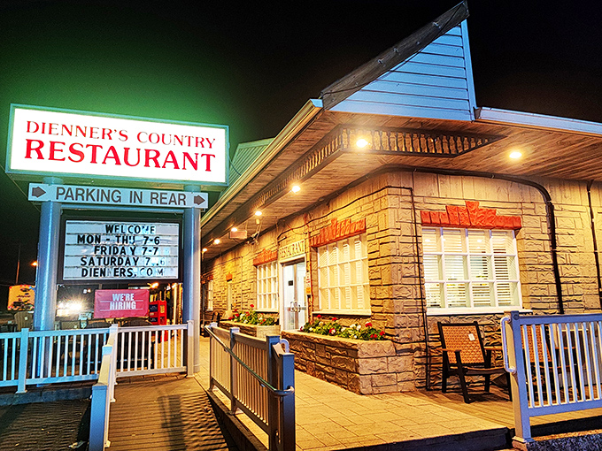 The glowing sign of Dienner's Country Restaurant beckons hungry travelers like a lighthouse for comfort food enthusiasts navigating the sea of Pennsylvania Dutch Country.