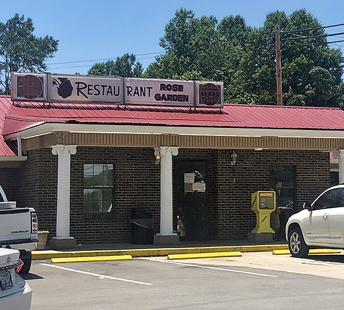 The unassuming brick exterior with its cheerful red roof promises no frills, just honest-to-goodness Tennessee cooking that'll make your soul smile.