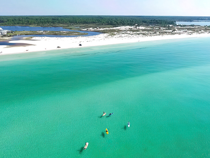Where freshwater meets saltwater in a mesmerizing dance. Western Lake spills into the Gulf, creating nature's own watercolor masterpiece at Grayton Beach.
