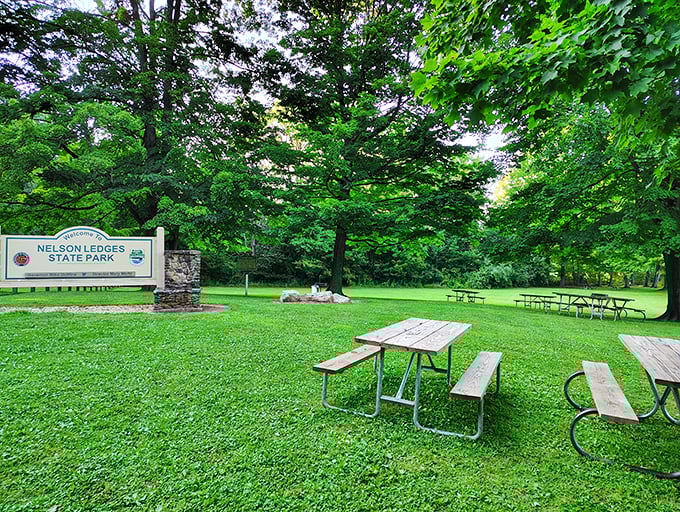 Nature's own infinity pool! Kayakers glide across mirror-like waters surrounded by Ohio's lush greenery, proving paradise doesn't require a passport.