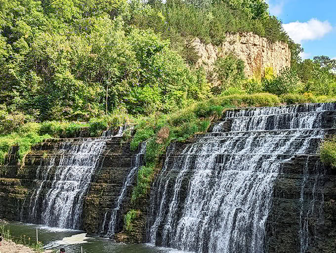 Mother Nature's Illinois surprise party! The multi-tiered Thunder Bay Falls cascades down limestone shelves, proving our prairie state has some vertical ambitions after all.