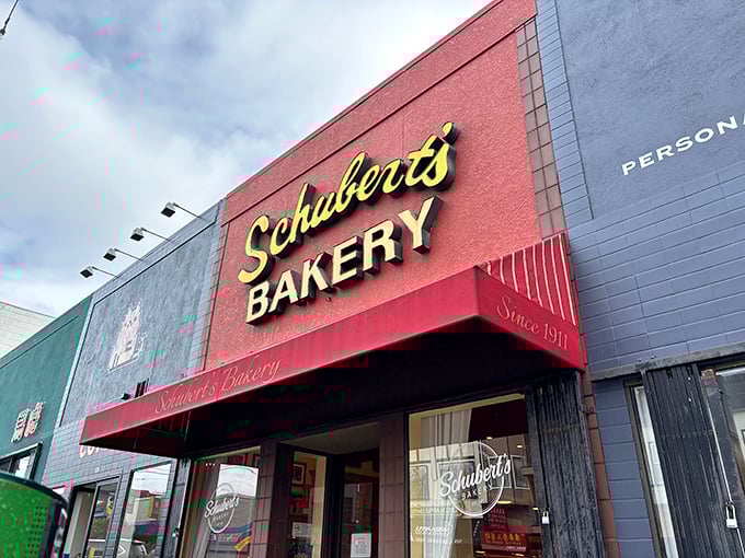 That classic red awning beckons like a beacon of buttery bliss on Clement Street's bustling sidewalk.