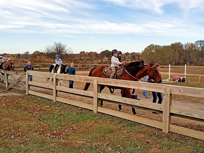 The classic red wagon awaits outside the Amish Welcome Center, where your journey into a simpler time begins with the clip-clop of hooves.