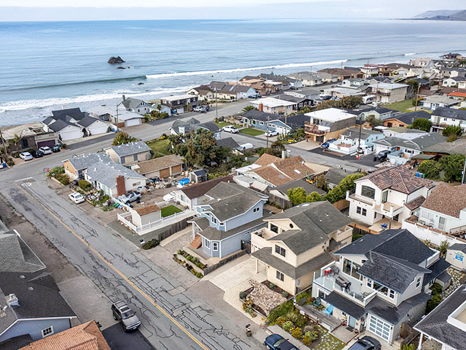 Coastal California living at its finest—where beach houses perch like spectators at nature's greatest show, the endless Pacific.