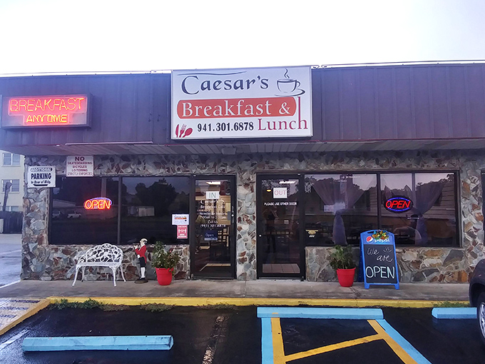 The unassuming stone facade of Caesar's might not scream "culinary destination," but that neon "BREAKFAST ANYTIME" sign is speaking my love language.