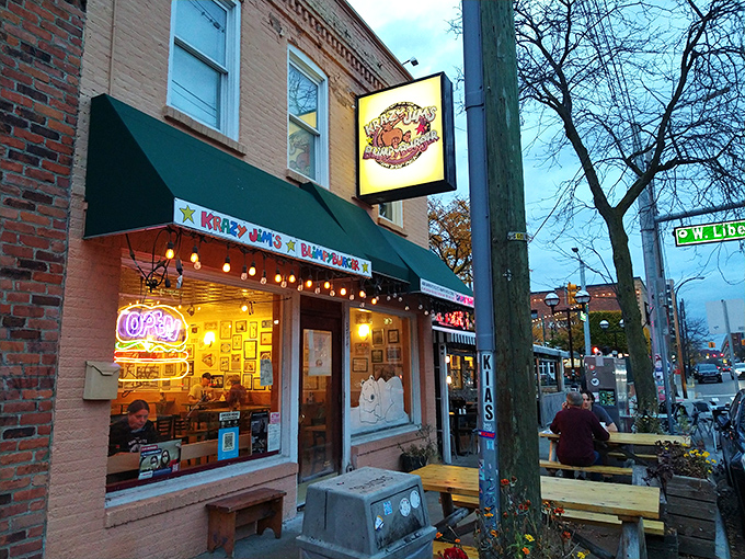 The unmistakable green awning and colorful signage of Blimpy Burger – Ann Arbor's burger institution where the rules are as distinctive as the food.
