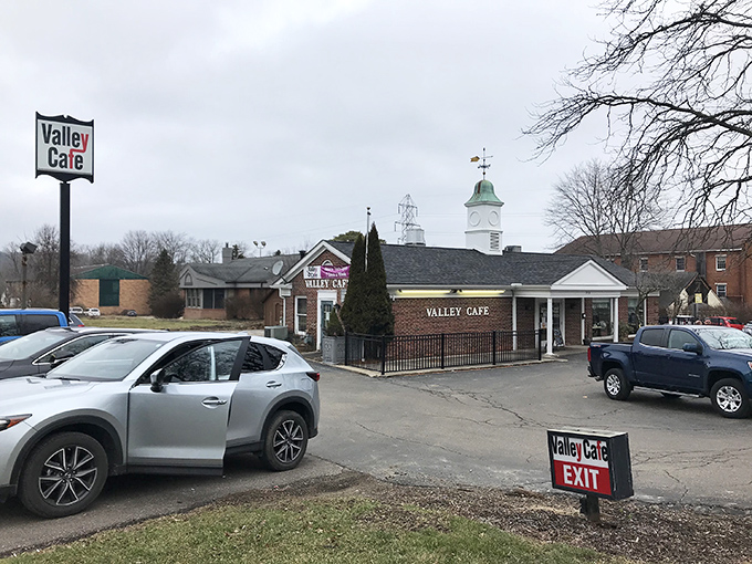 The unassuming brick exterior of Valley Café hides culinary treasures within, like finding a Picasso at a yard sale.