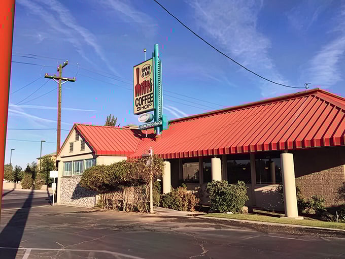 Milt's iconic red roof and vintage sign stand as a beacon of hope for hungry travelers on Bakersfield's horizon.