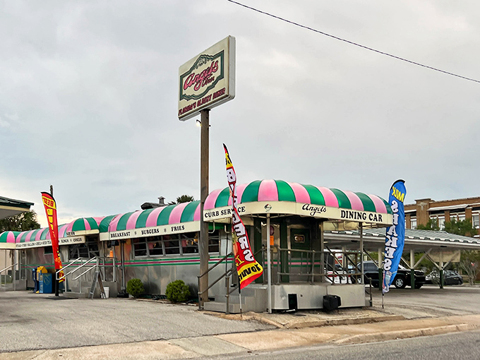 The iconic pink and green striped awning of Angel's Dining Car stands as a beacon of hope for hungry travelers. Florida's oldest diner doesn't need neon to shine.
