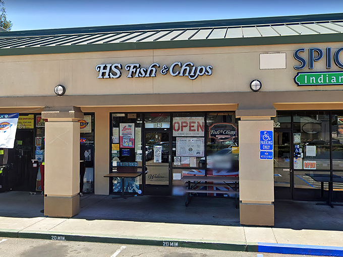 Strip mall treasure hunting at its finest! HS Fish & Chips shares space with Spicy Bite, hinting at the British-Indian fusion magic awaiting inside.