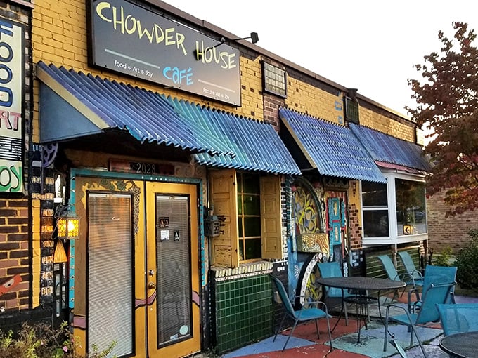 The sunshine-yellow exterior with vibrant blue awnings feels like stumbling upon a secret culinary treasure map where X marks the delicious spot.