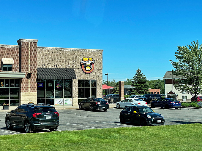 The brick exterior of Brews Brothers welcomes hungry travelers like a beacon of hope for empty stomachs. That smiling beer mug logo practically winks at you.