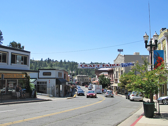 Main Street welcomes you with that iconic "Placerville - Old Hangtown" banner, where history and small-town charm collide under perfect Sierra foothills skies.