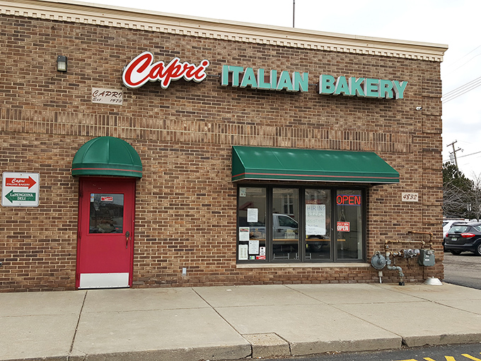 The unassuming brick exterior of Capri Italian Bakery stands like a culinary speakeasy &ndash; only the initiated know what treasures await inside.