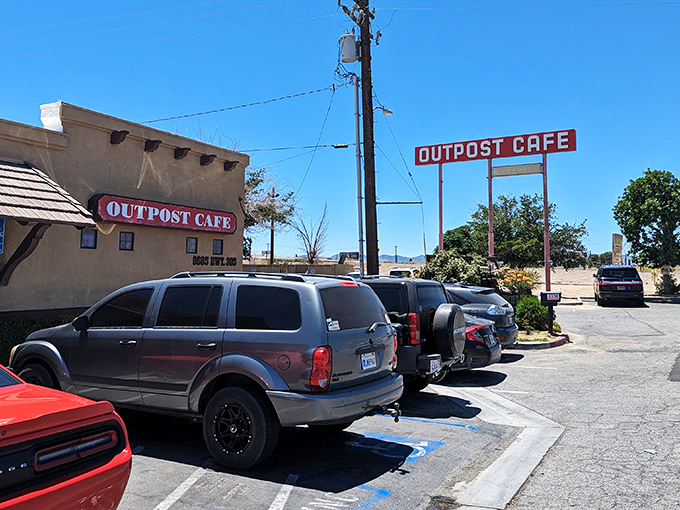 The iconic red sign beckons like an old friend against the desert sky&mdash;a promise of comfort food that's kept travelers returning for generations.