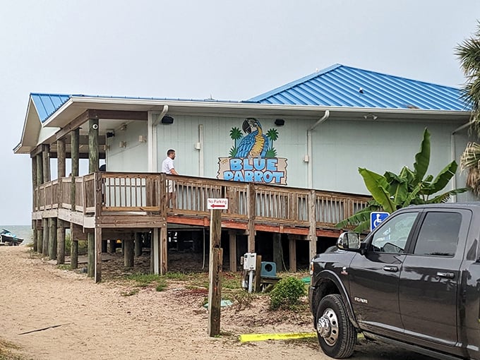 The bright blue roof beckons like a tropical oasis on stilts. Beach access and seafood? That's not a vacation, that's heaven on earth.