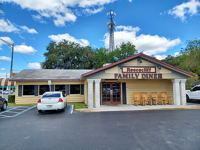 The unassuming exterior of Reececliff hides culinary treasures within, like finding a diamond mine disguised as a garden shed. Those rocking chairs aren't just for show!