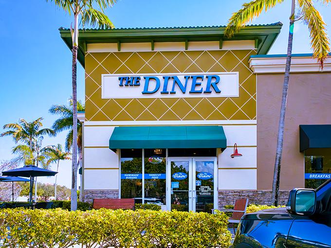 Palm trees standing guard outside The Diner like tropical ma&icirc;tre d's welcoming you to breakfast paradise in Boynton Beach. 