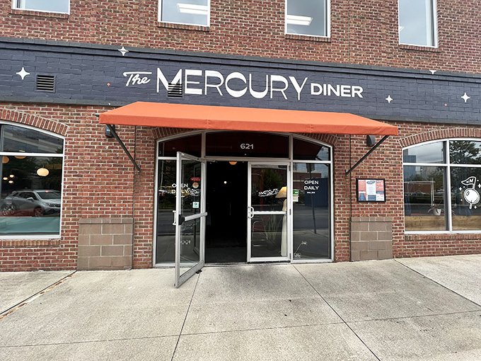 The brick-and-mortar promise of breakfast nirvana, complete with retro-futuristic signage that practically screams "pancakes await within!"