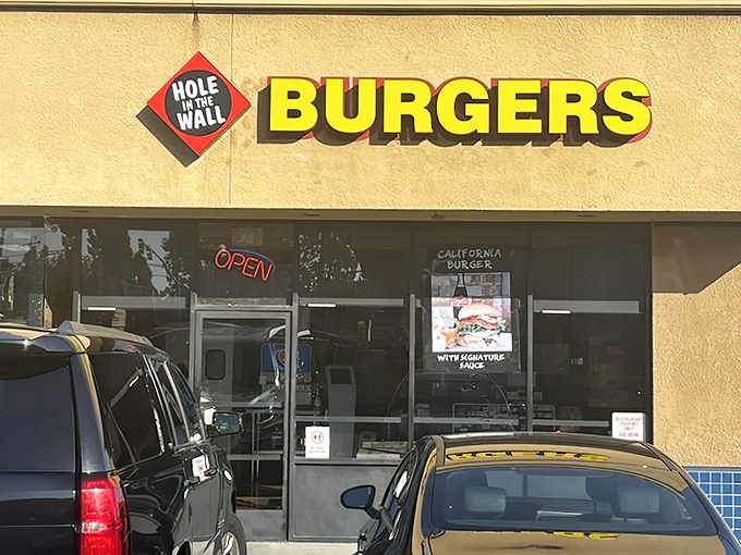 That bright yellow "BURGERS" sign isn't trying to be fancy—it's a beacon of honest-to-goodness deliciousness waiting inside.