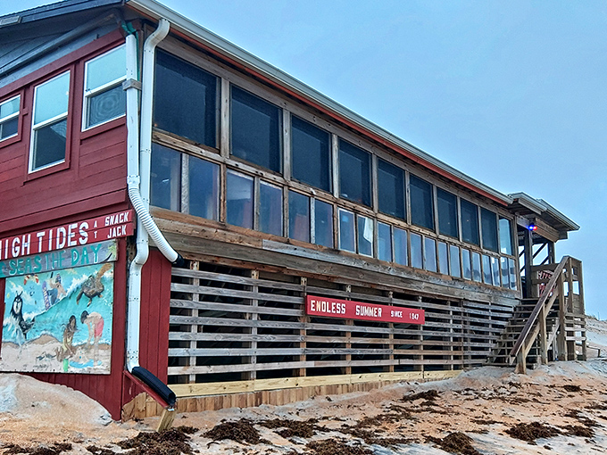 The weathered red exterior of High Tides at Snack Jack isn't trying to impress anyone, yet somehow manages to impress everyone who visits this beachfront treasure.