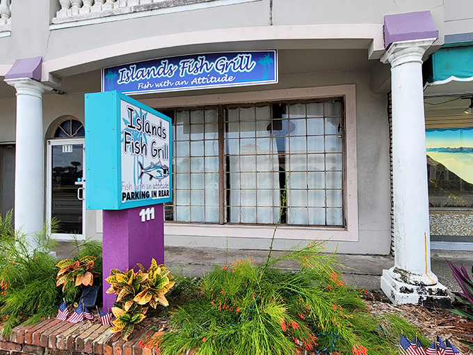 The unassuming turquoise and purple storefront might not stop traffic, but locals know this modest exterior hides seafood treasures worth discovering.