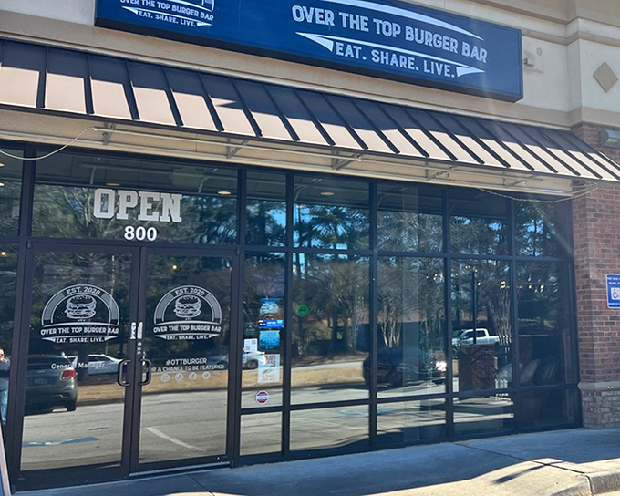 The unassuming storefront of Over The Top Burger Bar hides culinary madness within. Like finding a Ferrari engine in a station wagon.