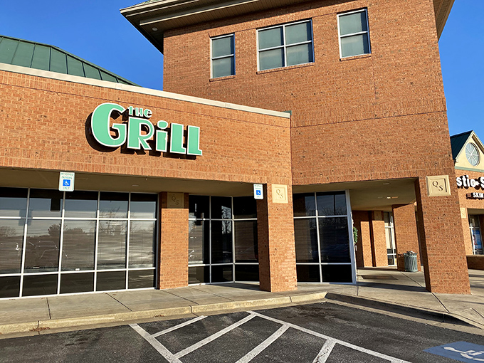 The brick exterior with its bold green sign promises no pretension&mdash;just honest food that speaks volumes without needing a fancy facade.