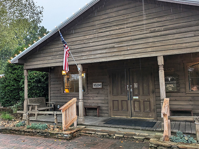 Rustic charm meets culinary excellence at this weathered wooden exterior. Like finding a treasure map where X marks the spot for exceptional steaks.