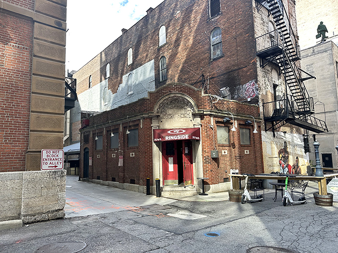 The historic brick fa&ccedil;ade of Ringside Caf&eacute; beckons with its distinctive red doors and vintage "RATHSKELLER" inscription&mdash;a Columbus landmark hiding culinary treasures within.