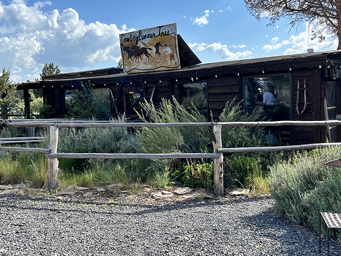 The rustic exterior of Cowboy Dinner Tree stands defiant against Oregon's high desert, like a time capsule from the Wild West that refuses to be buried.