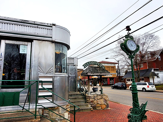 The classic stainless steel exterior of Daddypops stands like a time machine to better breakfasts, complete with that iconic green clock keeping diner time.
