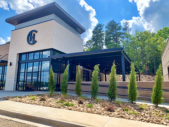 Modern elegance meets small-town charm at Chophouse of Chapin's striking exterior. The sleek design and signature "CH" logo promise culinary adventures await inside.