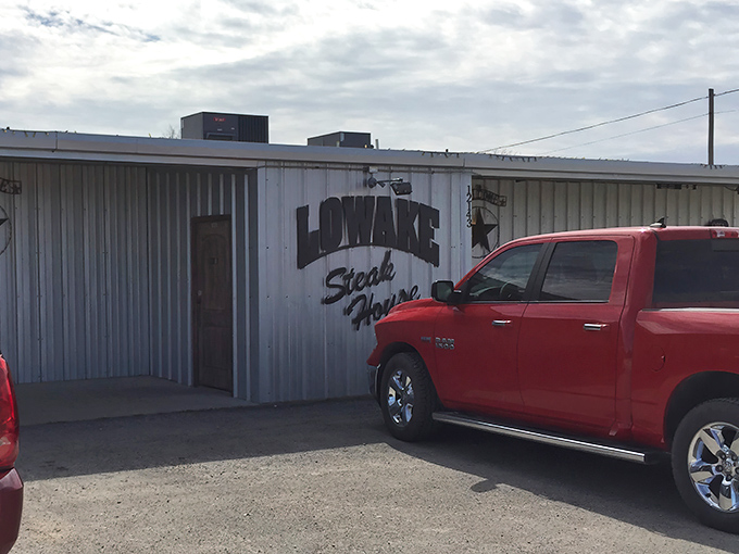 The unassuming exterior of Lowake Steak House proves once again that in Texas, the most spectacular steaks often hide behind the simplest facades.