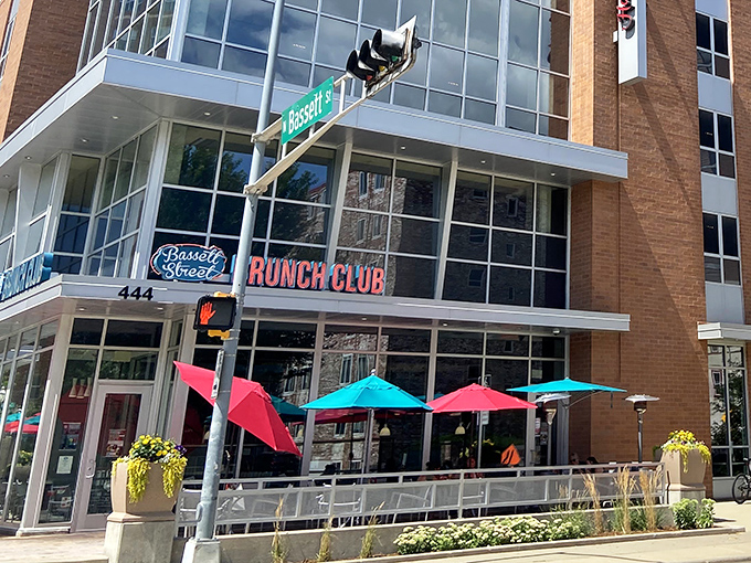 The corner beacon of breakfast bliss! Bassett Street Brunch Club's modern exterior promises morning magic with its bright signage and welcoming windows.