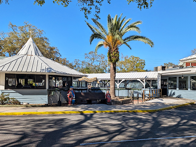 The unassuming exterior of Dixie Crossroads belies the seafood treasures within. Florida charm at its most authentic.