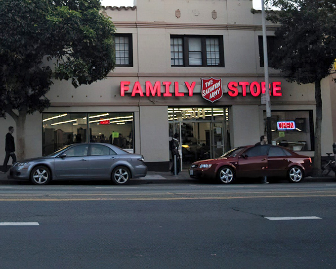 The iconic red "FAMILY STORE" sign beckons like a lighthouse for bargain hunters navigating the sea of San Francisco retail options.