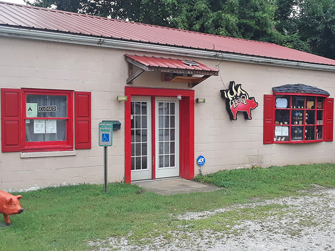 The unassuming exterior of B3Q Barbecue with its signature flying pig sign promises smoky treasures within. Sometimes the best food hides in plain sight.