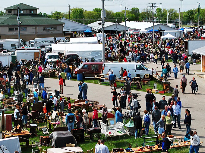 The bustling fairgrounds transform into a treasure hunter's paradise, where crowds navigate a maze of vendors offering everything from Victorian furniture to vintage fishing lures.