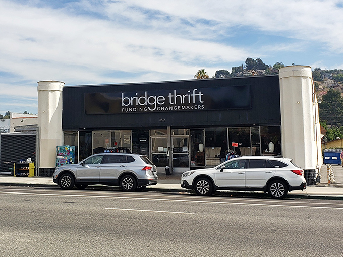 The sleek black exterior of Bridge Thrift stands out on Eagle Rock Boulevard like a beacon for bargain hunters seeking treasures with purpose.