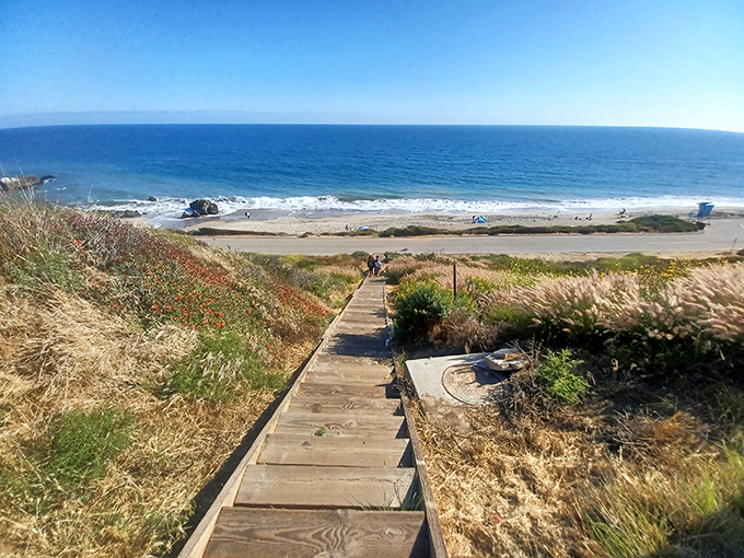Wooden steps leading to paradise &ndash; where every descent brings you closer to that perfect California moment you've been dreaming about all week. 