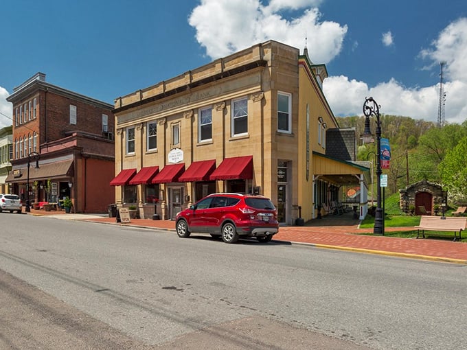 Historic storefronts with bright red awnings &ndash; like a Norman Rockwell painting that somehow serves excellent coffee and Wi-Fi.