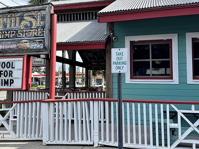 The turquoise exterior with its weathered sign promises no-frills authenticity. This is Florida seafood without the pretense.