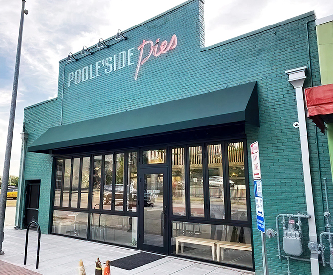The iconic turquoise exterior of Poole's beckons like a culinary lighthouse in downtown Raleigh, promising unforgettable meals within.