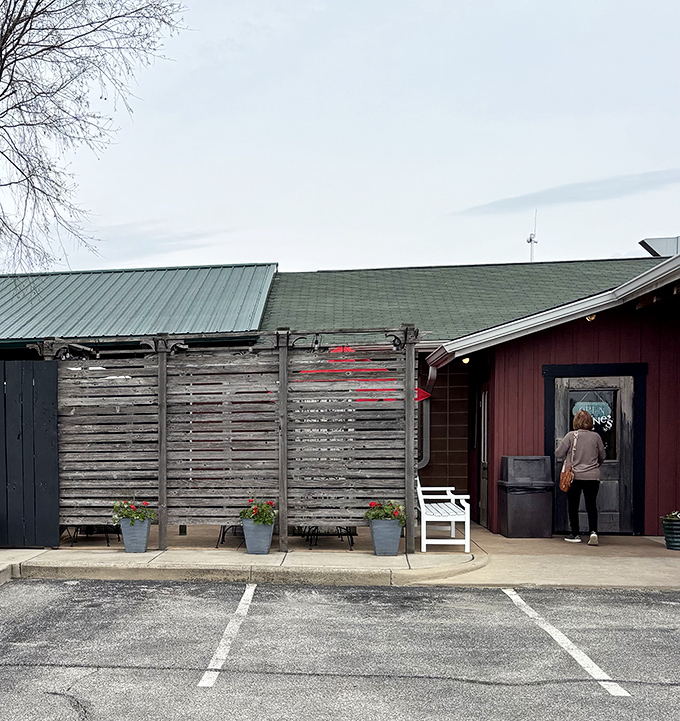 The British invasion has landed in Gas City! A rustic red building with a Union Jack sign promises culinary adventures far from London but close to home.