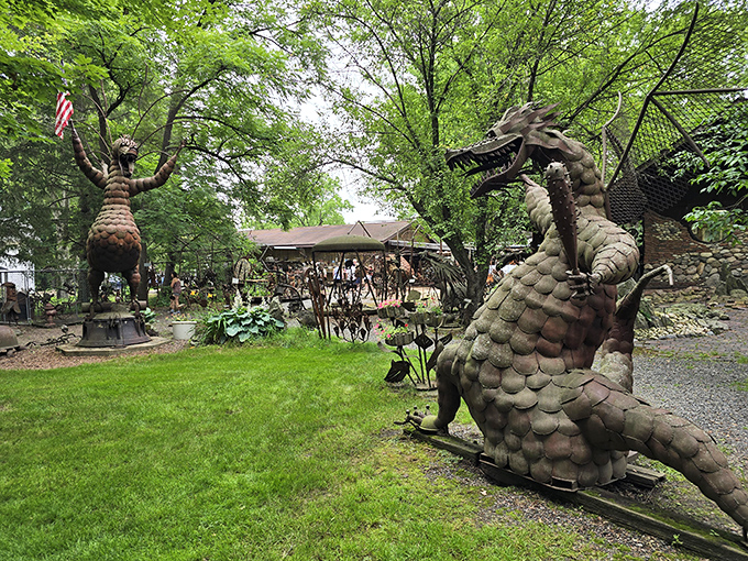 The fearsome marsh dragon stands guard at Jurustic Park, its metallic scales gleaming in the sunlight as fellow prehistoric creatures lurk nearby.