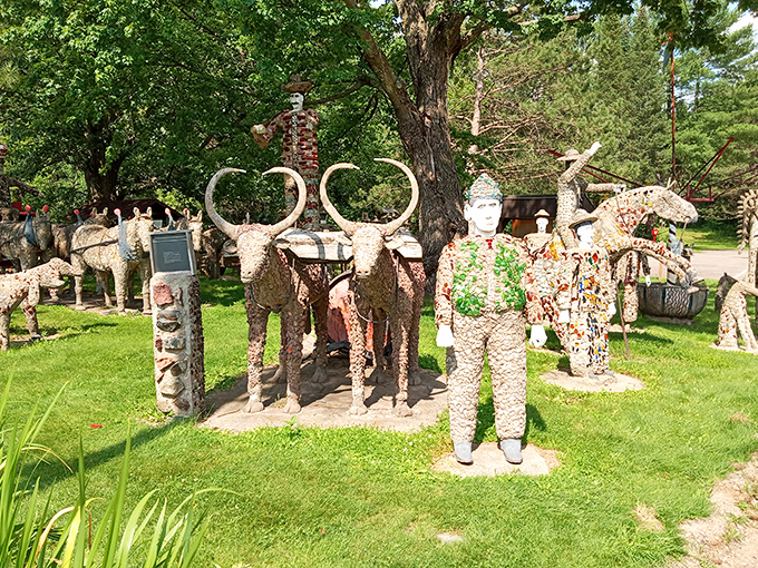 Welcome to Wisconsin's most delightfully bizarre roadside attraction, where concrete people have been having the same conversation since the Eisenhower administration.