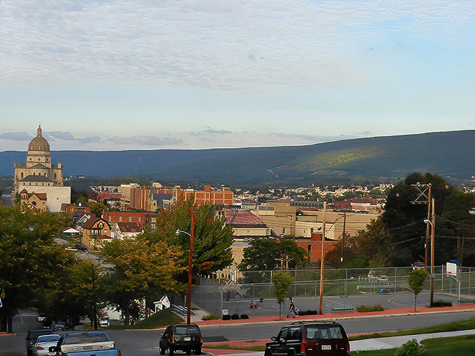 The city nestles perfectly between rolling mountains, proving that Mother Nature herself is Altoona's most talented architect. That dome still steals the show from any angle.